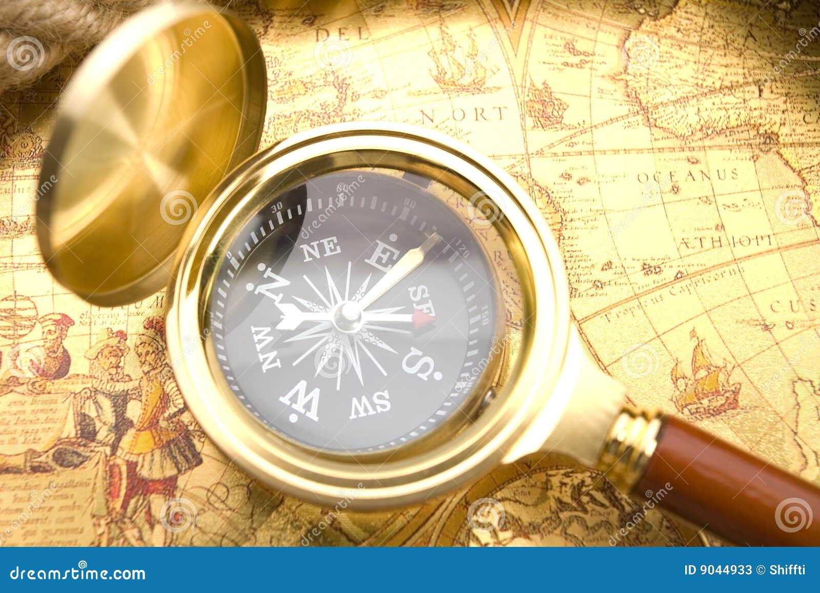 Old compass and magnifier stock image. Image of west, golden - 9044933