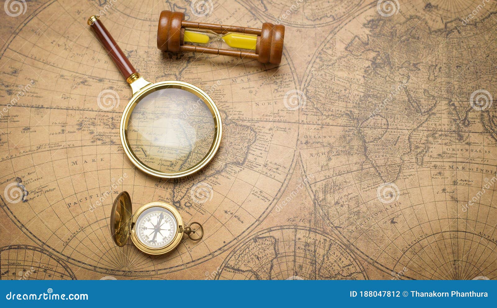 Old Compass , Magnifying Glass and Sand Clock on Vintage Map Stock ...