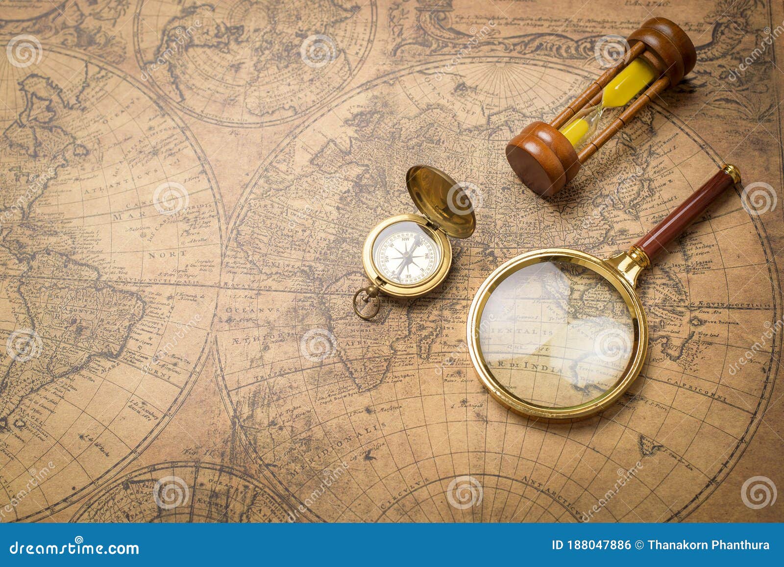 Old Compass , Magnifying Glass and Sand Clock on Vintage Map Stock ...
