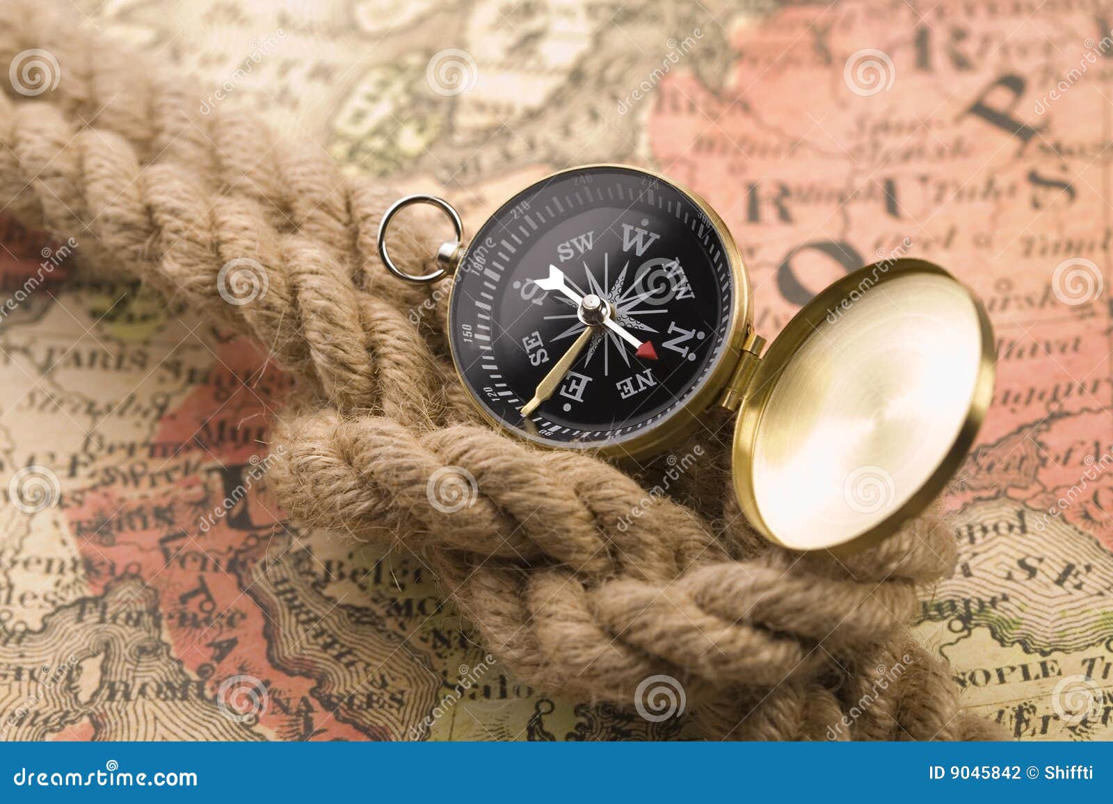 Old compass and rope stock photo. Image of west, compass - 9045842
