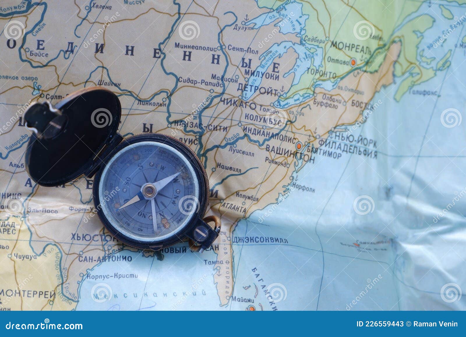 Old Compass on the Russian-language Map of the World. Concept Stock ...