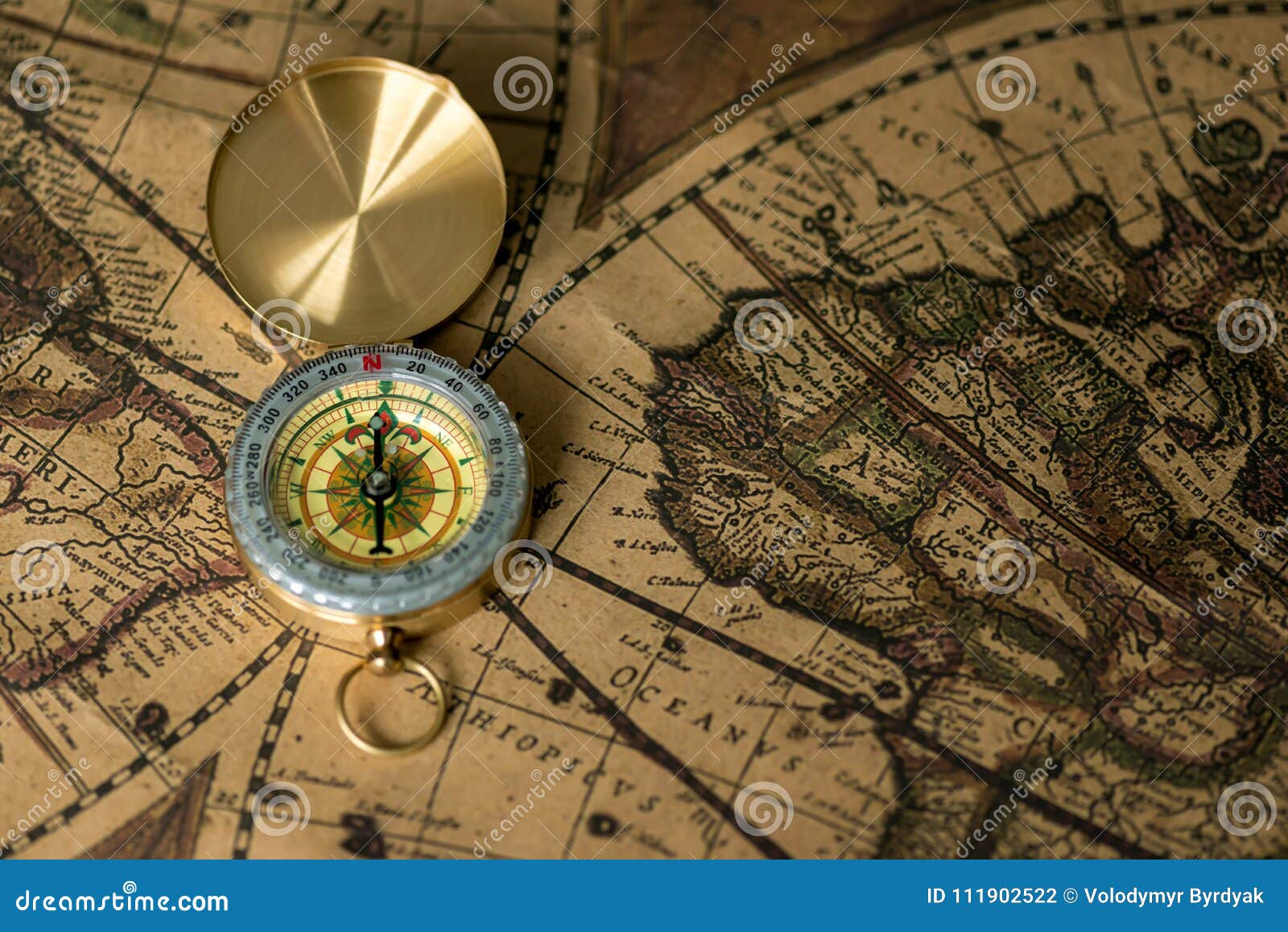 Old compass on vintage map stock photo. Image of navigate - 111902522