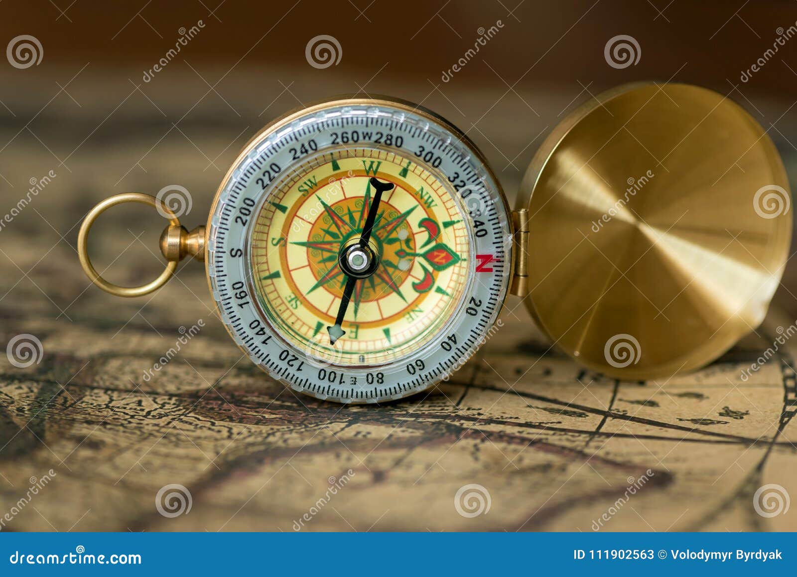 Old compass on vintage map stock image. Image of nautical - 111902563