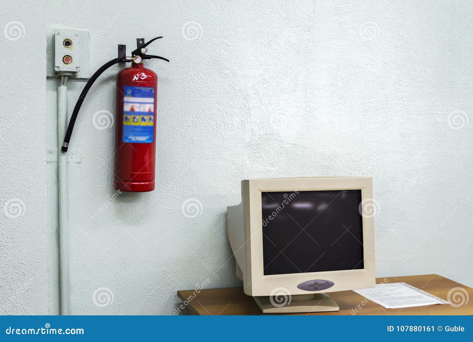Old Computer and a Fire Extinguisher on the Wall Stock Image - Image of ...