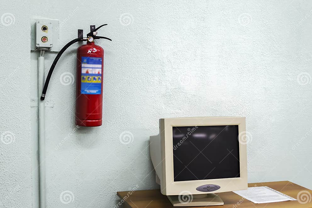 Old Computer and a Fire Extinguisher on the Wall Stock Image - Image of ...