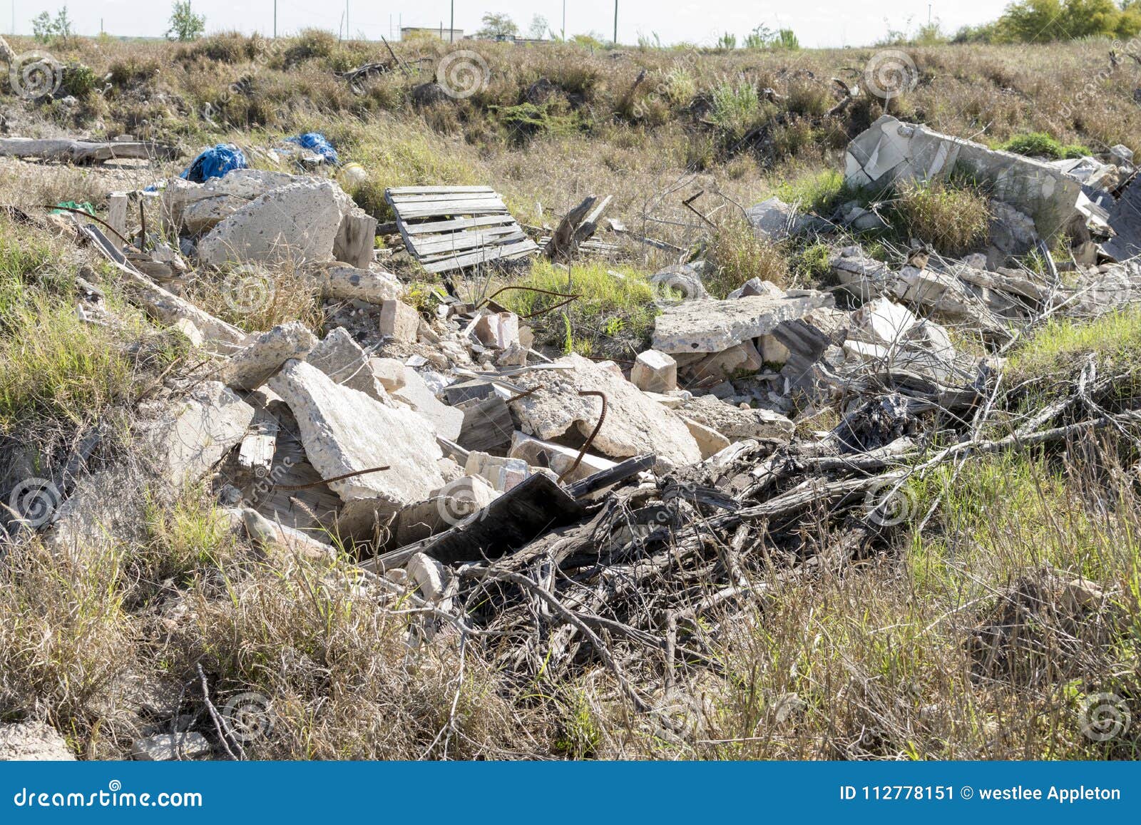 Trash and Construction Material Polluting an Empty Lot Stock Image ...