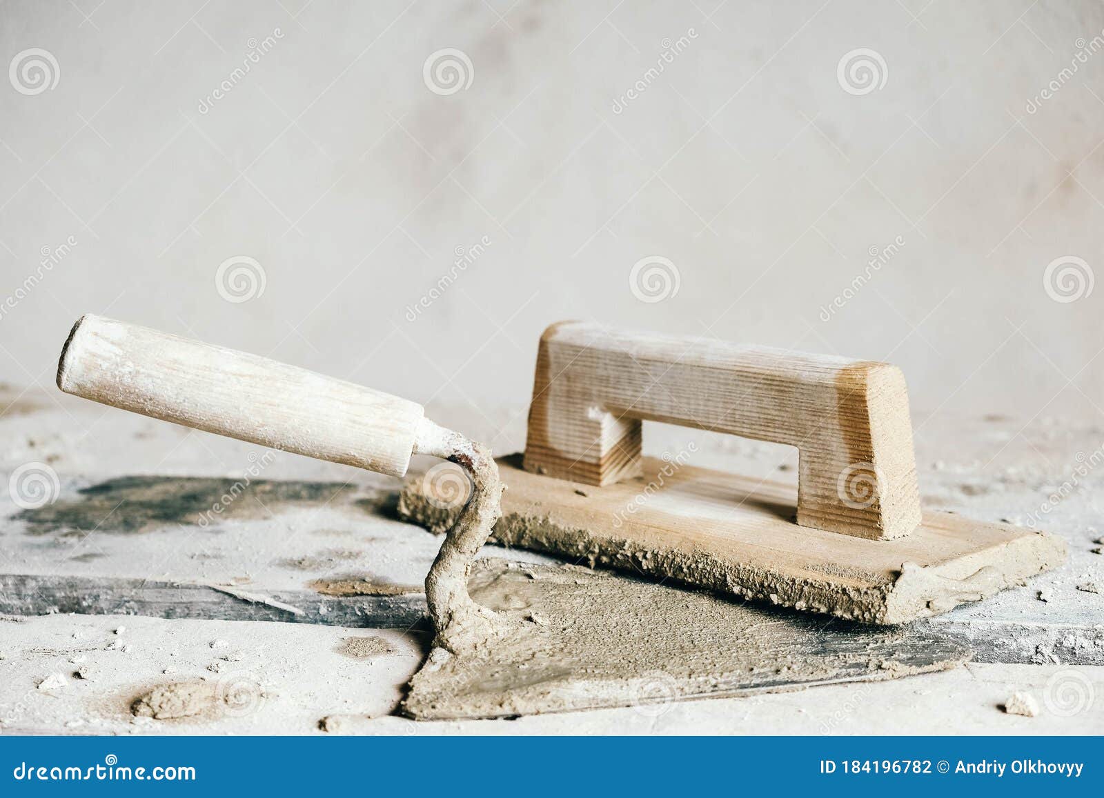 Old Construction Tools for Plaster on Vintage Wood Bench. Trowels and ...