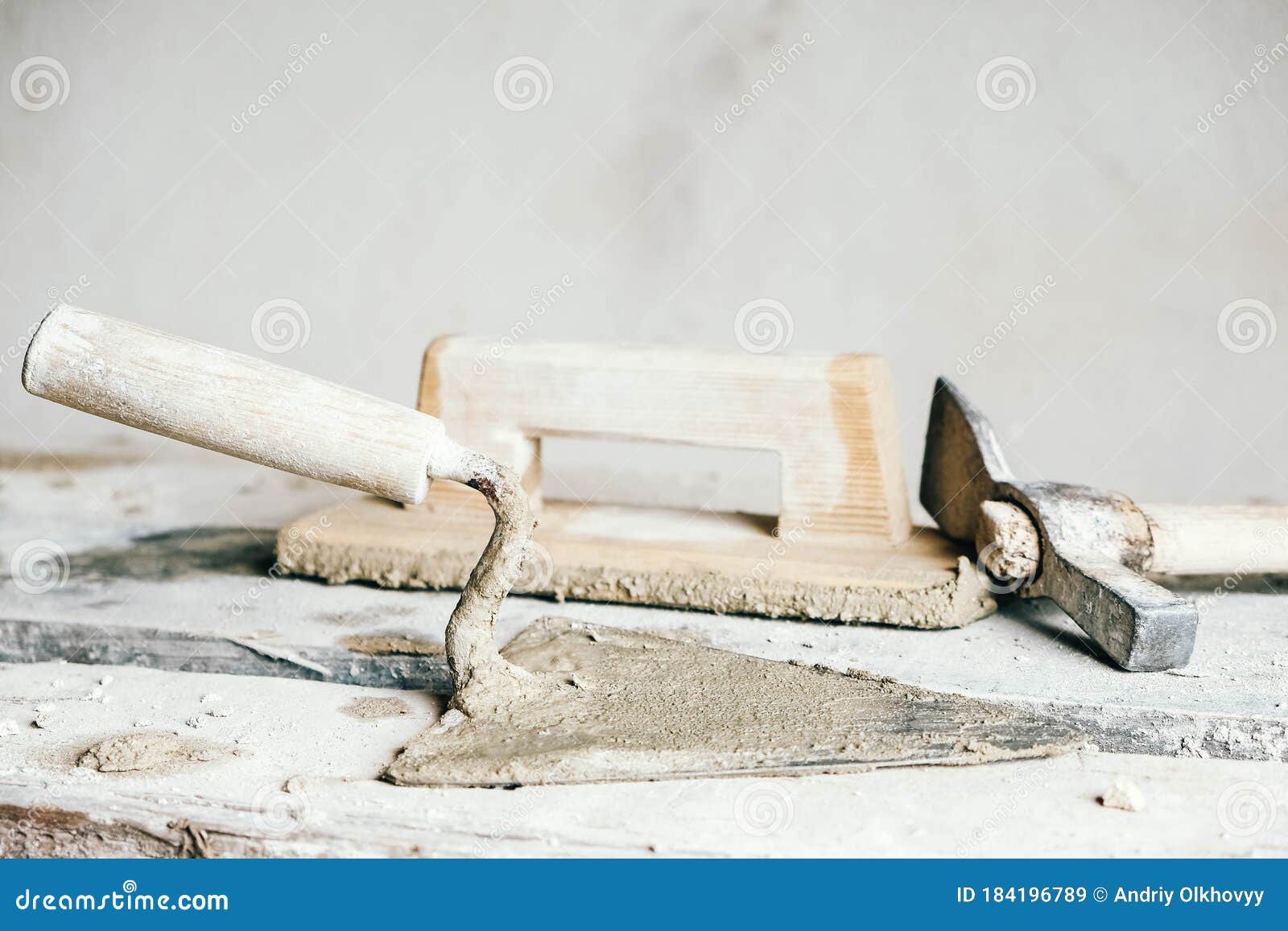 Old Construction Tools for Plaster on Vintage Wood Bench. Trowels and ...