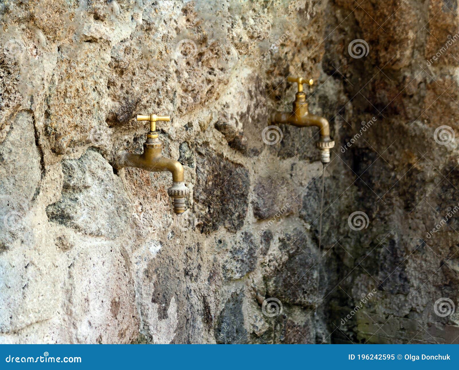 Old Copper Taps in Stone Wall Stock Image - Image of drop, fountain ...