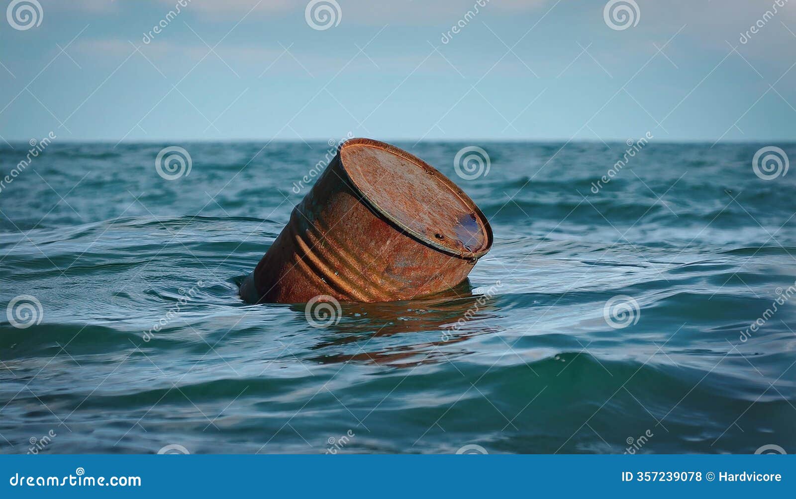 Old Corroded Barrel Drifting on the Surface of the Ocean. Industrial ...