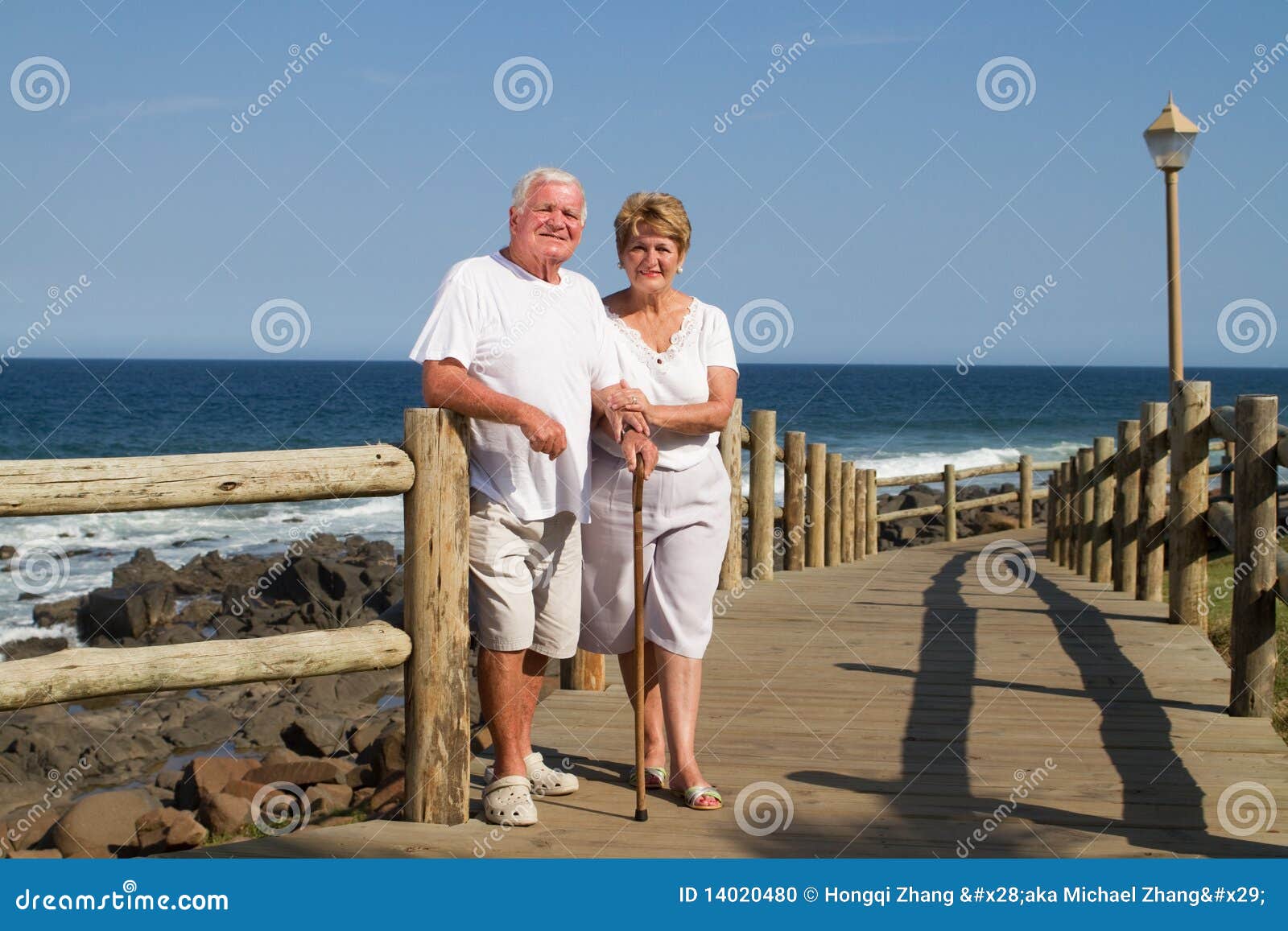 Old couple on beach stock photo. Image of closeup, happy - 14020480