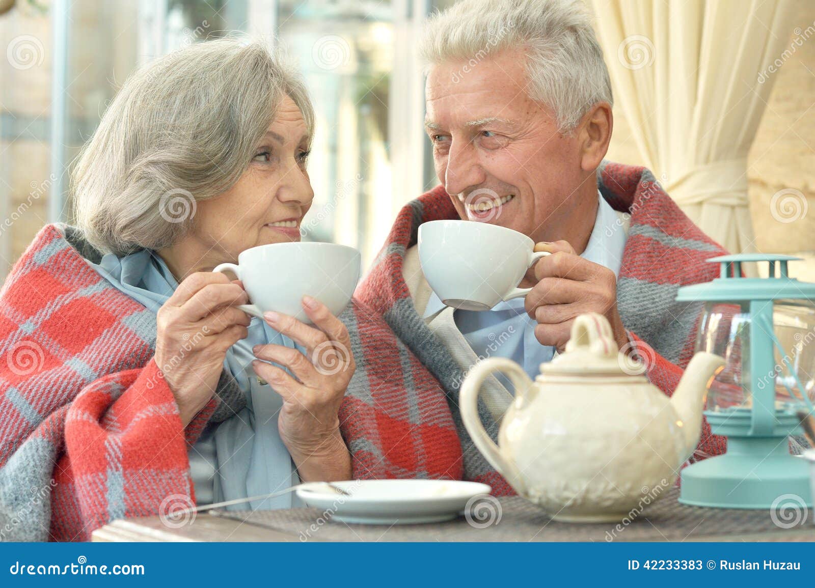 Old couple drinking tea stock image. Image of cute, aged - 42233383
