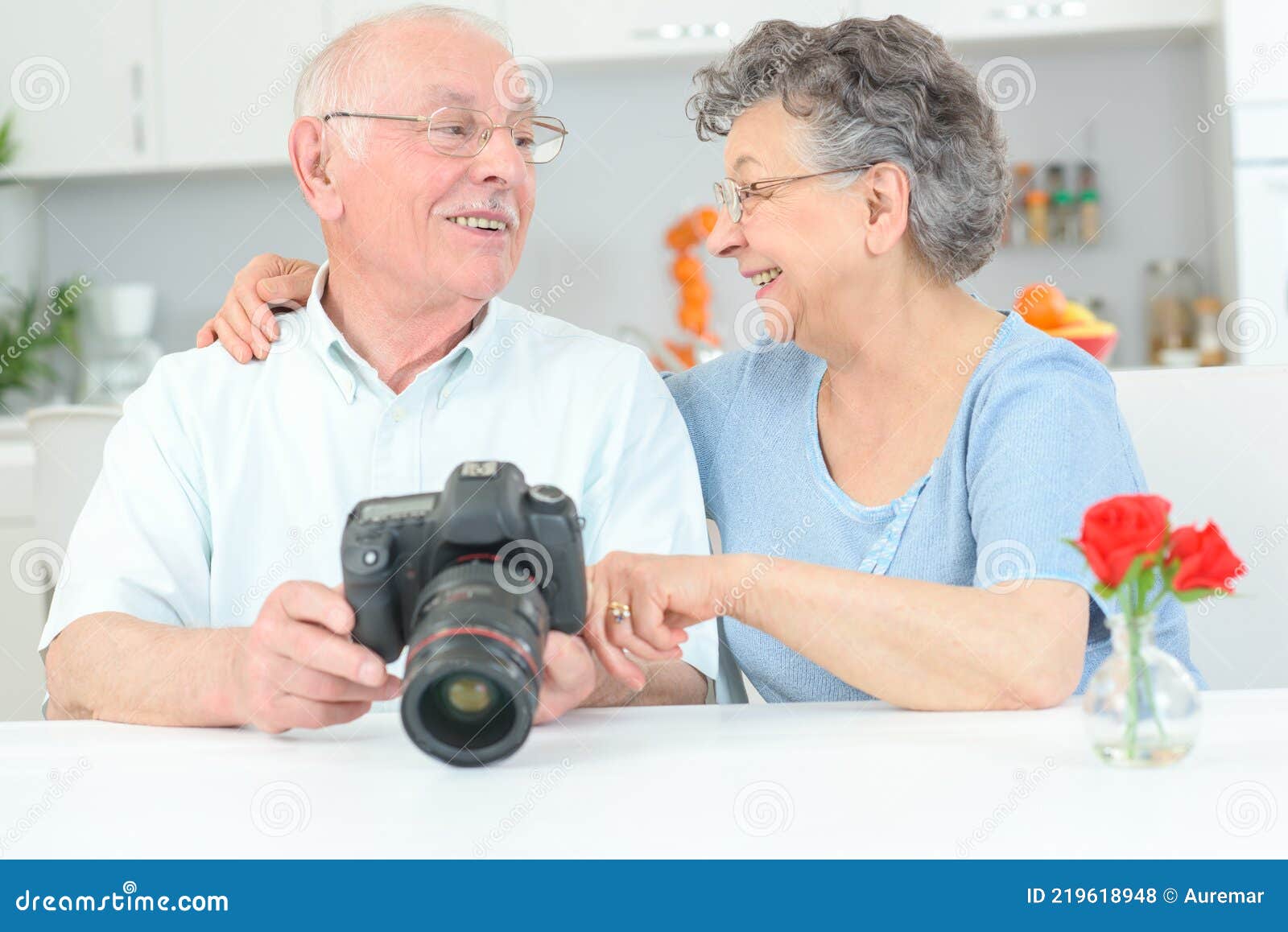Old couple with hobby stock photo. Image of photographer - 219618948