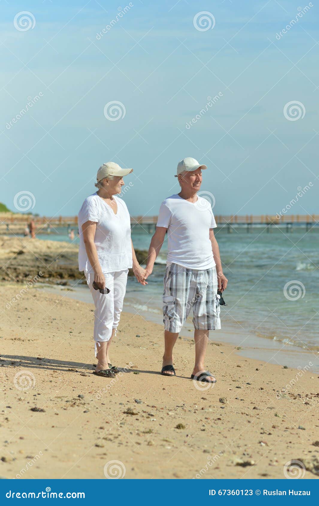 Old couple on sea beach stock image. Image of happy, kindness - 67360123