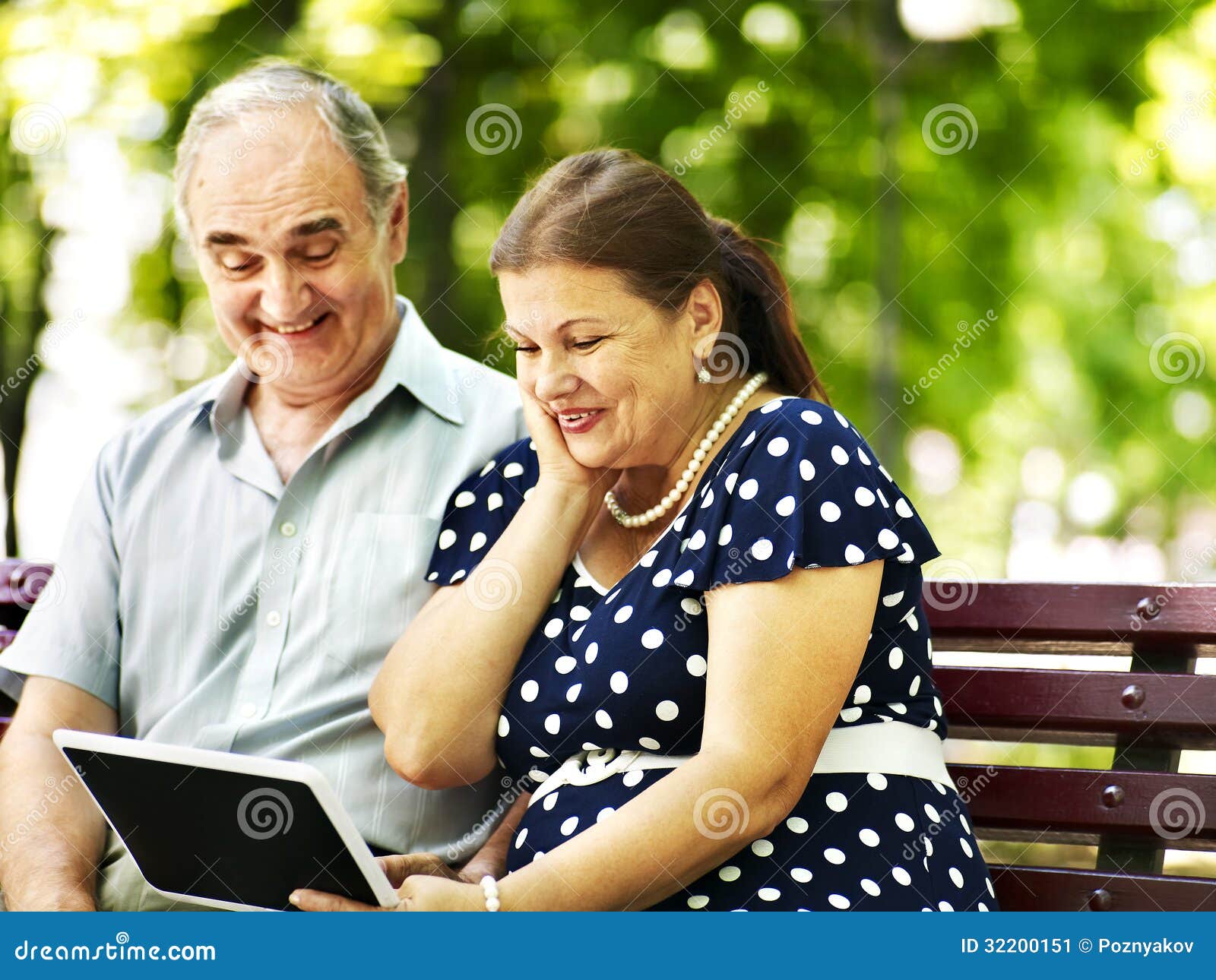 Old Couple with Tablet Pc Sit on Bench . Stock Image - Image of ...