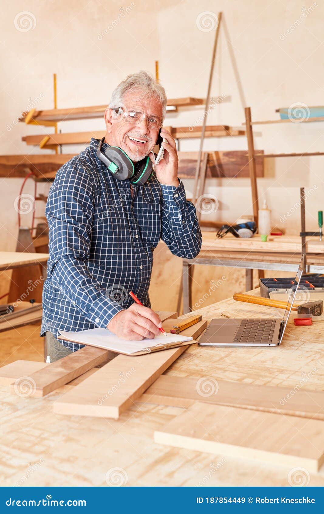 Old Craftsman with Mobile Phone and Checklist Stock Image - Image of ...