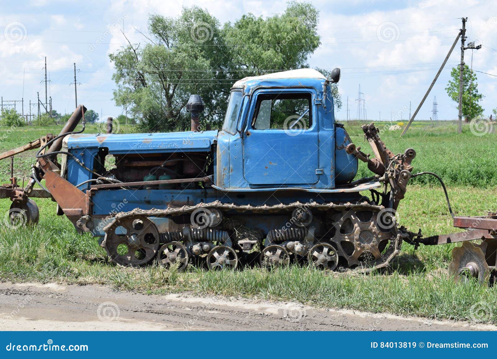 Old Crawler Tractor Standing in a Field Editorial Stock Image - Image ...