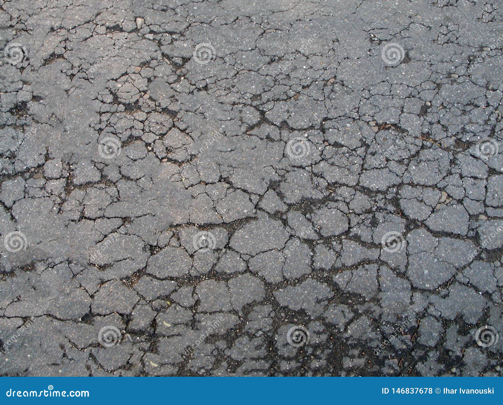 The Old Crumbling Asphalt Driveway with a Textured Surface Stock Photo ... The Old Crumbling Asphalt Driveway with a Textured Surface Stock Photo ...