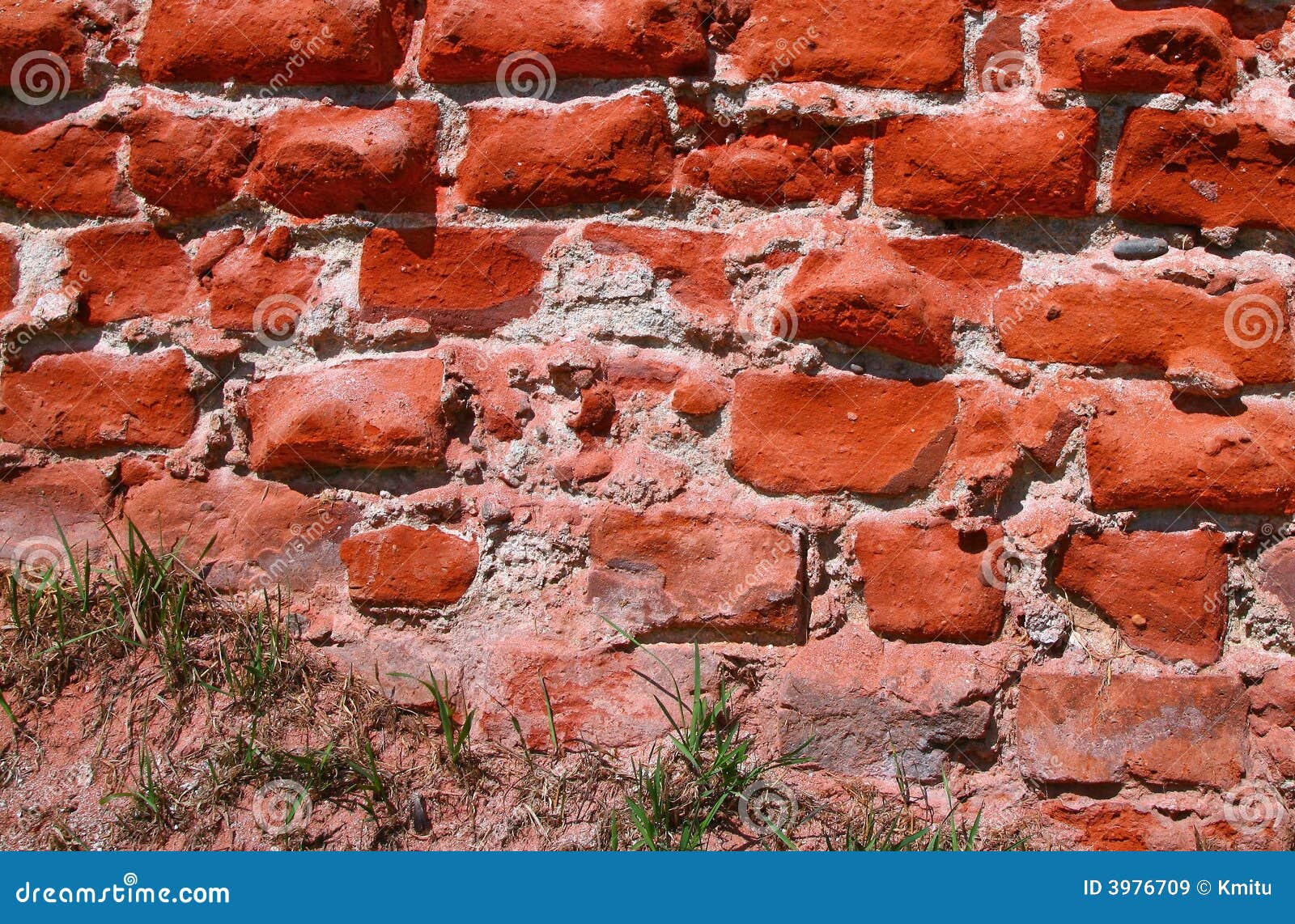 Old Crumbling Brick Wall stock image. Image of grass, detail - 3976709