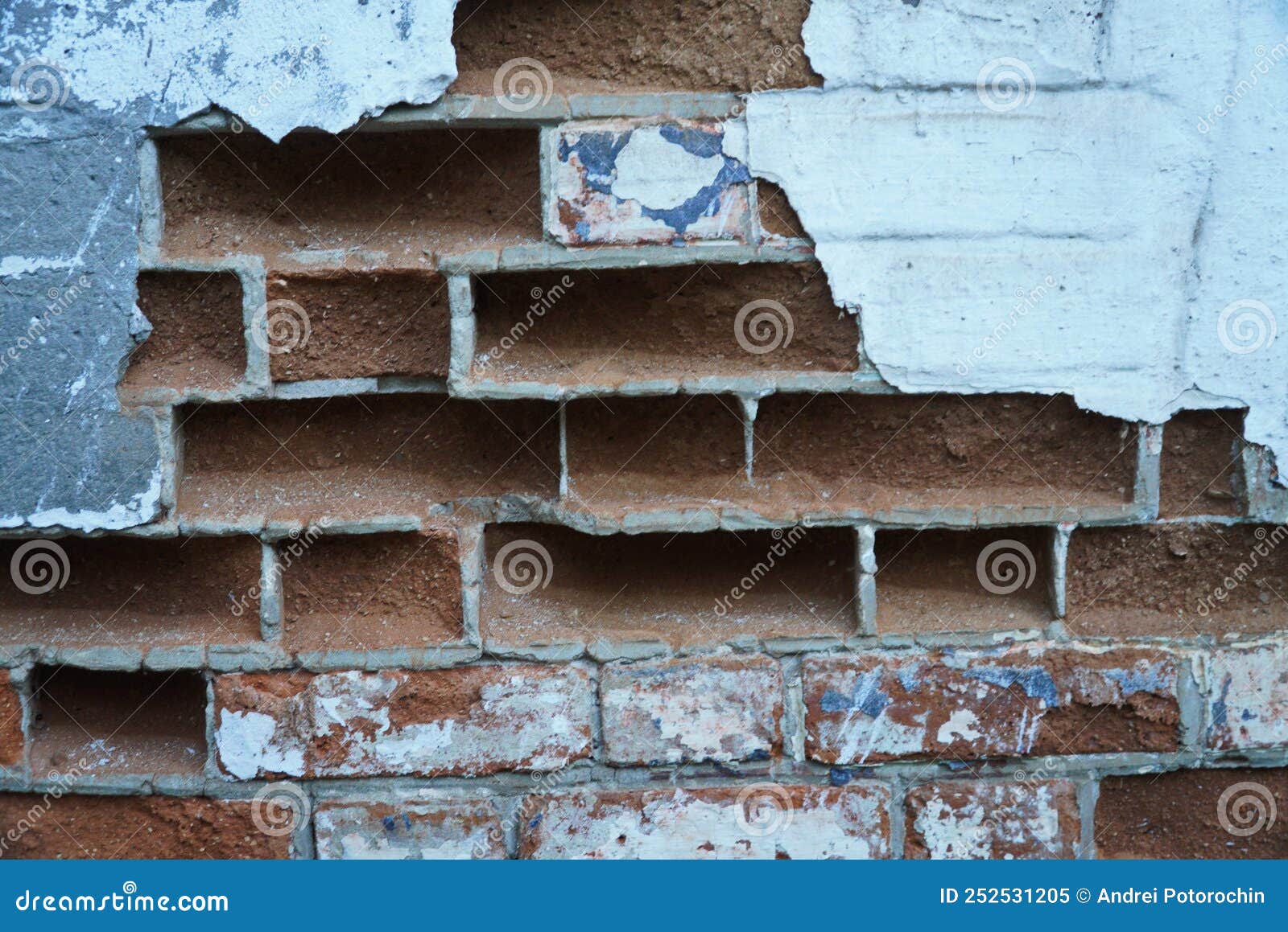 An Old Crumbling Wall with Destroyed Bricks between a Strong Masonry ...