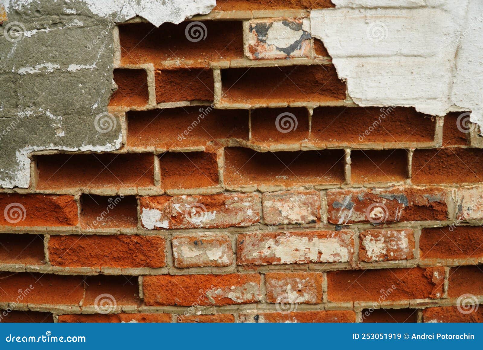An Old Crumbling Wall with Destroyed Bricks between a Strong Masonry ...