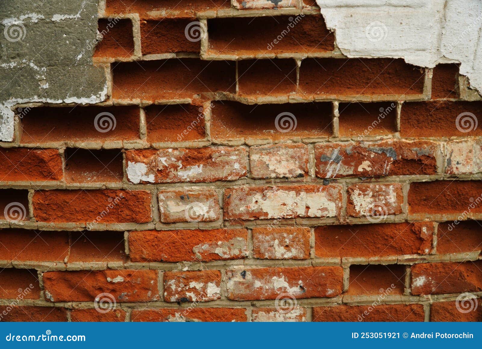 An Old Crumbling Wall with Destroyed Bricks between a Strong Masonry ...