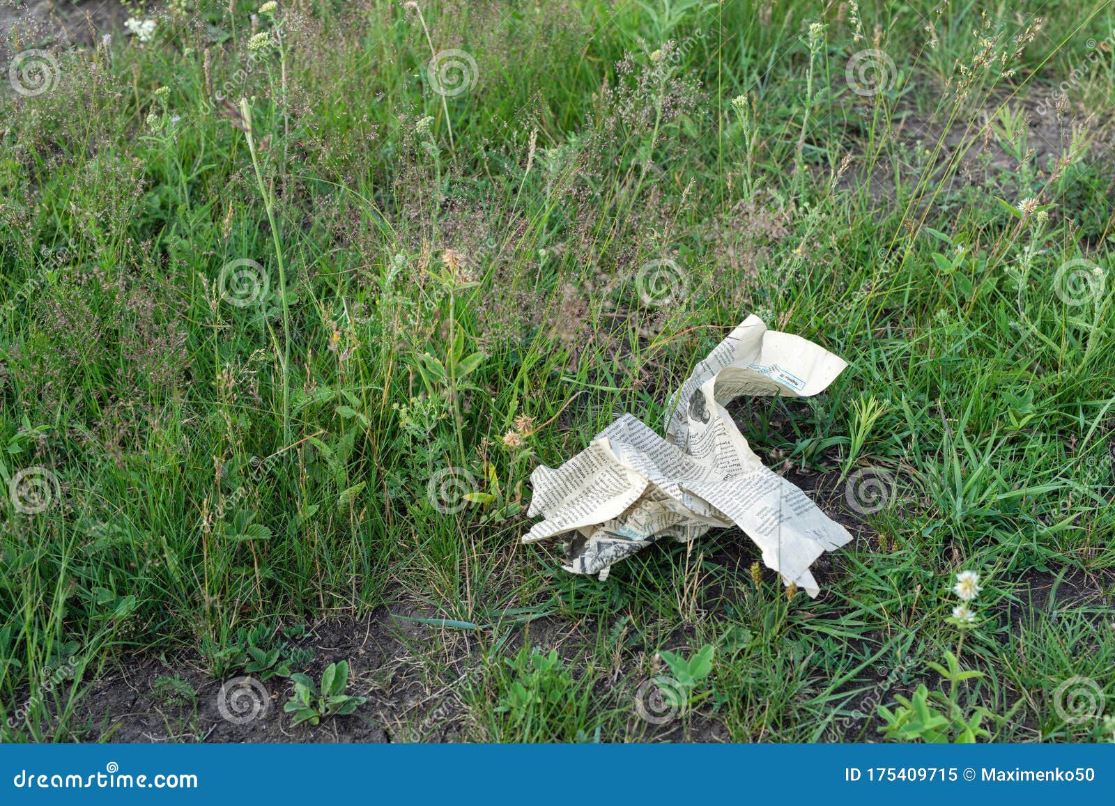 Old Crumpled Sheet of Newspaper on Grass Stock Image - Image of dirty ...