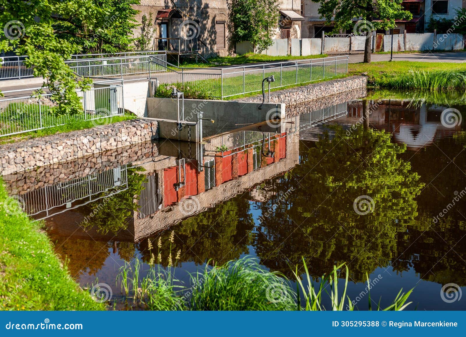 Old Dam on the Pond. Concrete Construction with Reflection in Water ...