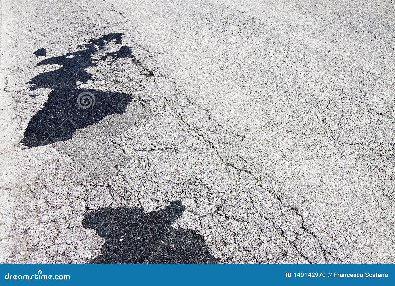 Damaged Asphalt Texture Stock Photo | CartoonDealer.com #194455326