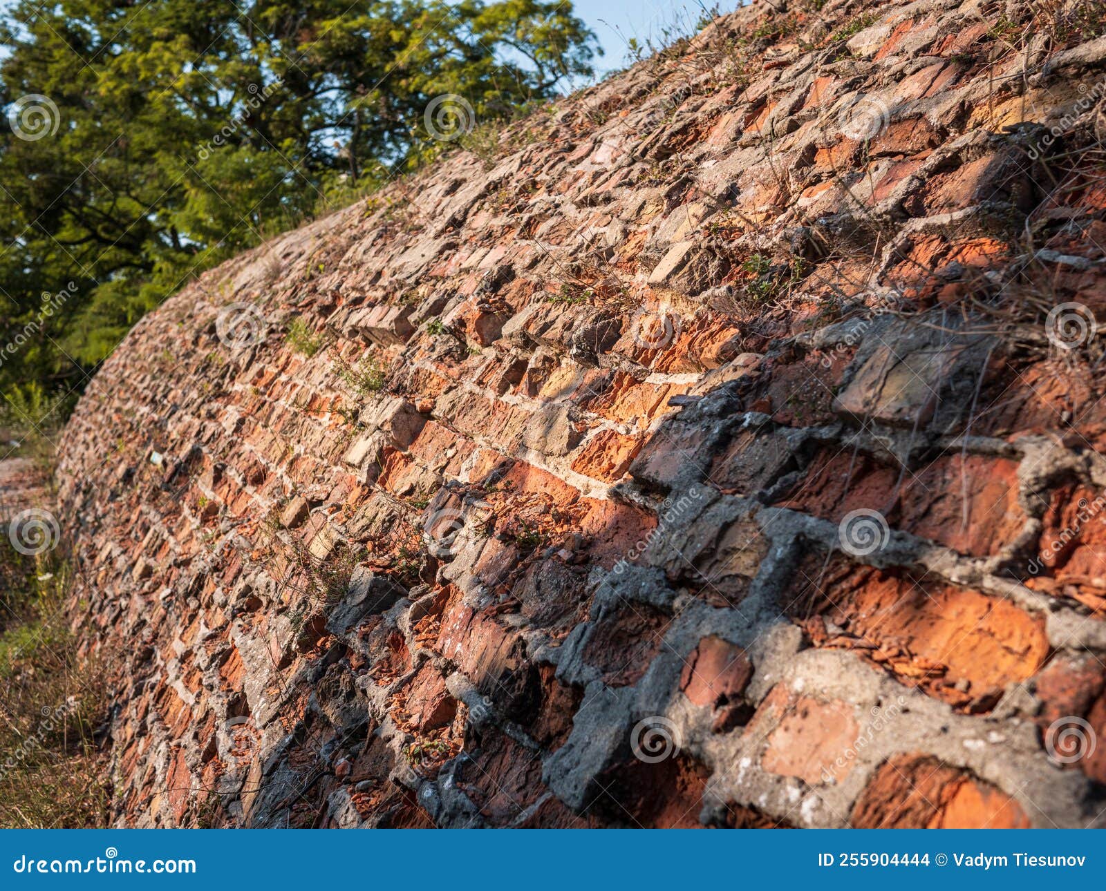 Old Damaged by Bullets and Shells Brick Red Wall of the Ancient ...