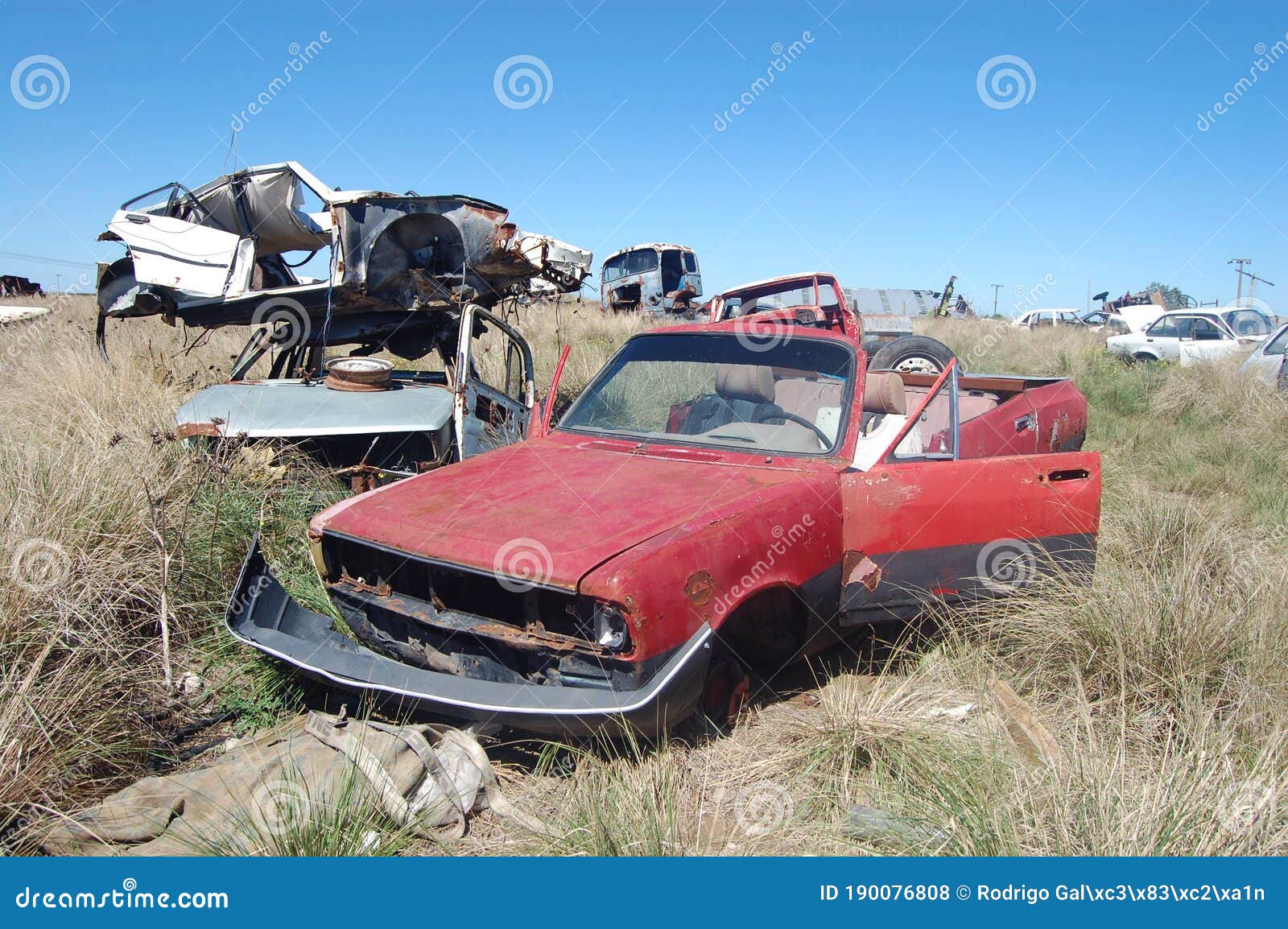 Old Damaged Cars in the Junkyard. Car Graveyard Stock Photo - Image of ...