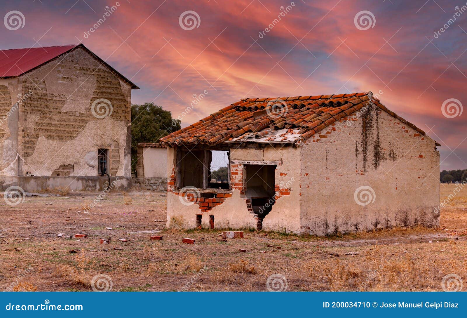 Old Damaged House with a Beautiful Orange Sky Stock Photo - Image of ...