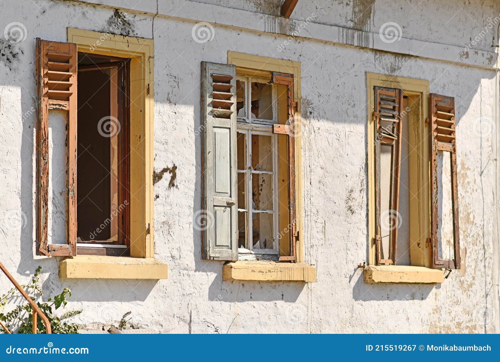 Old Damaged Windows with Shutters of Old Abandoned Building Stock Image ...