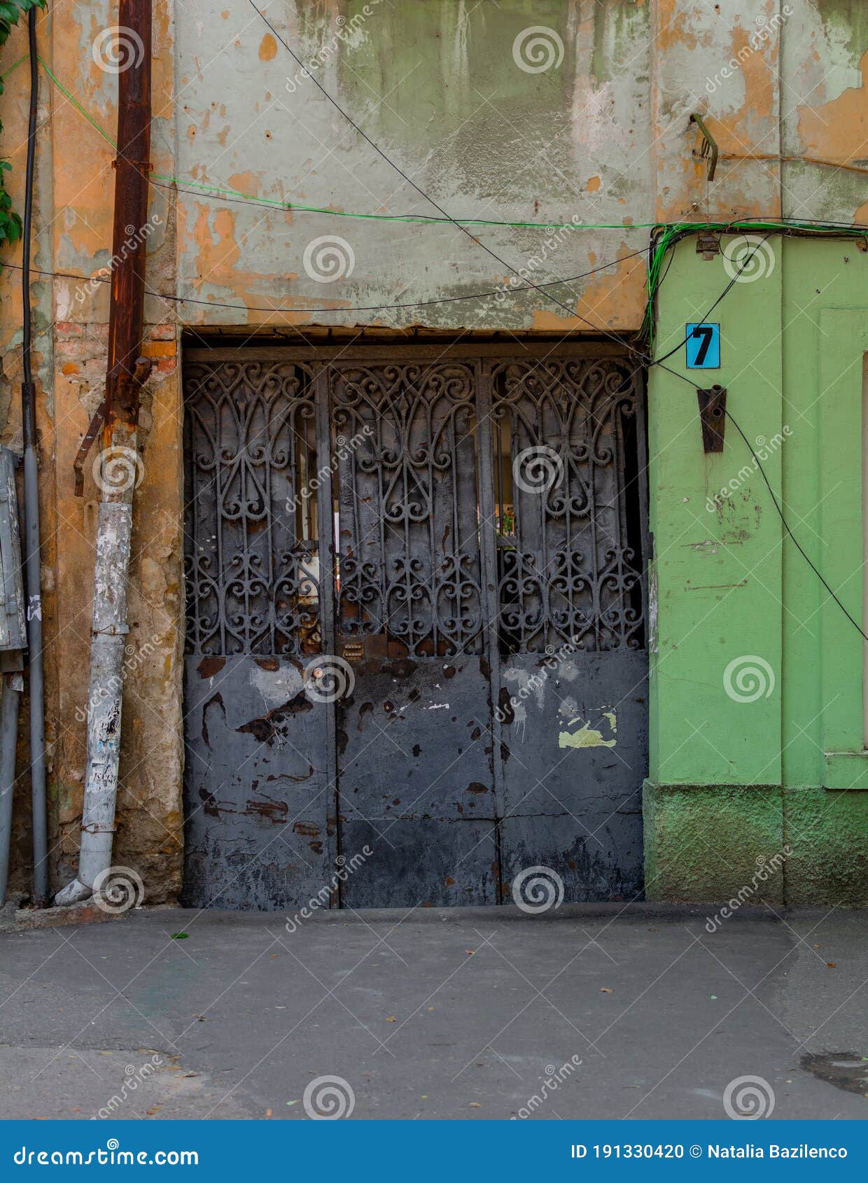 Old Decaying Building with Rusty Wrought Iron Gates Editorial Image ...