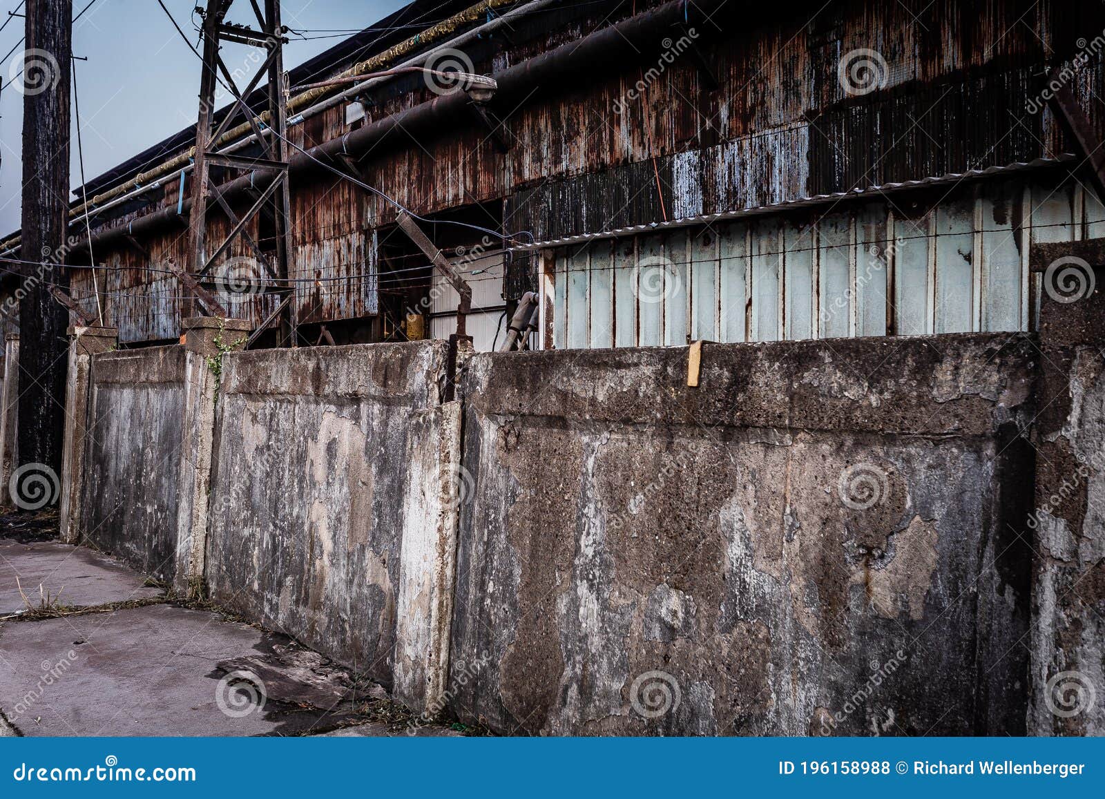 Old Decaying Wall in Front of Abandoned Factory Stock Photo - Image of ...