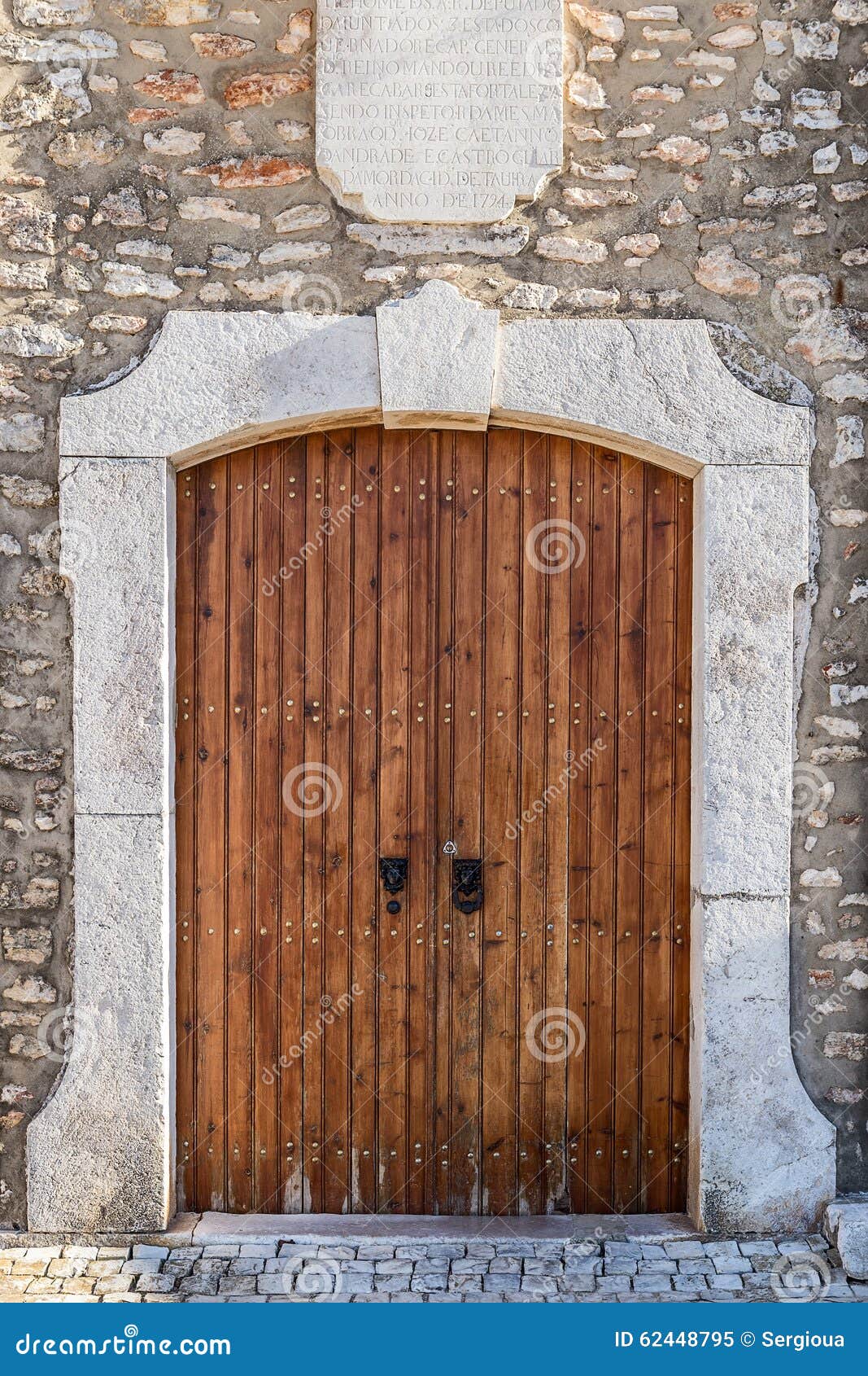 Old Decorative Door in a Stone Wall. Stock Image - Image of dirty ...