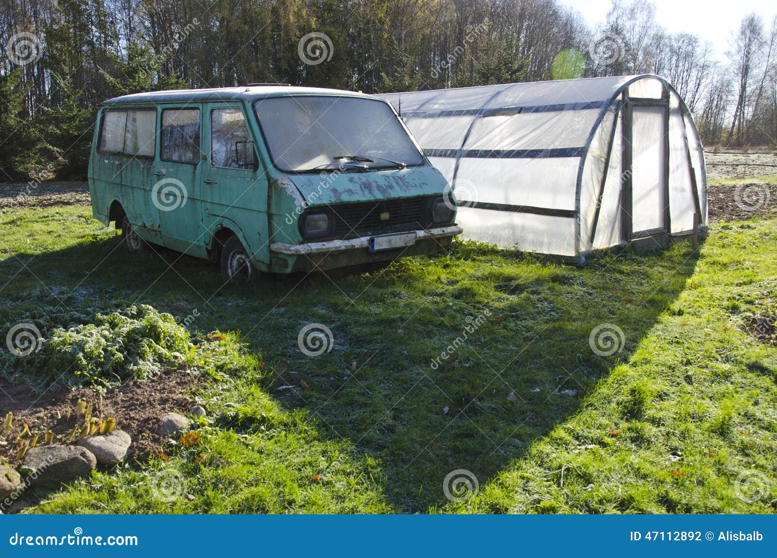 Old Derelict Car and Plastic Greenhouse in Farm Stock Photo - Image of ...