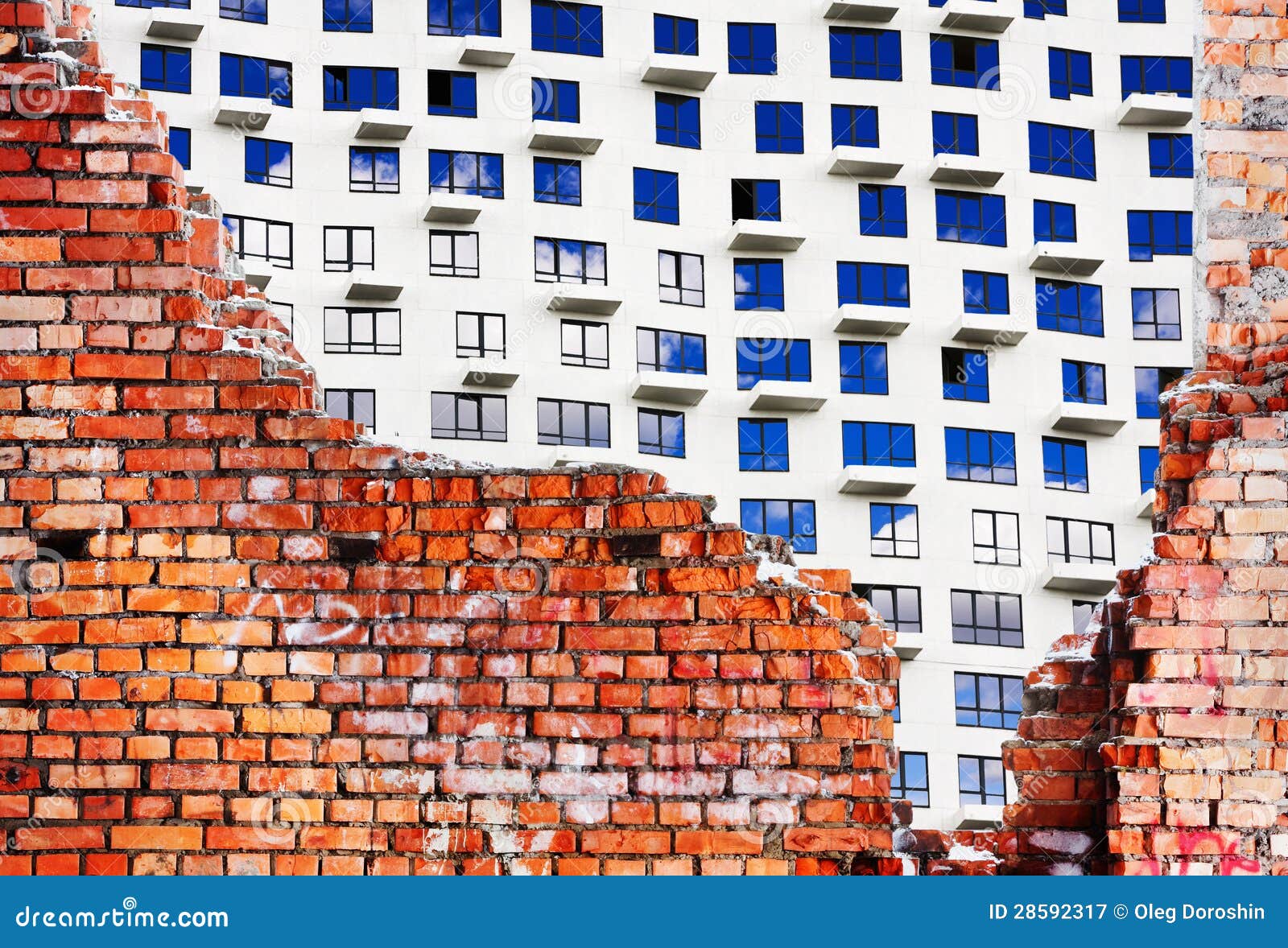 Old Destroyed Brick Wall of the Building and a New House Under C Stock ...