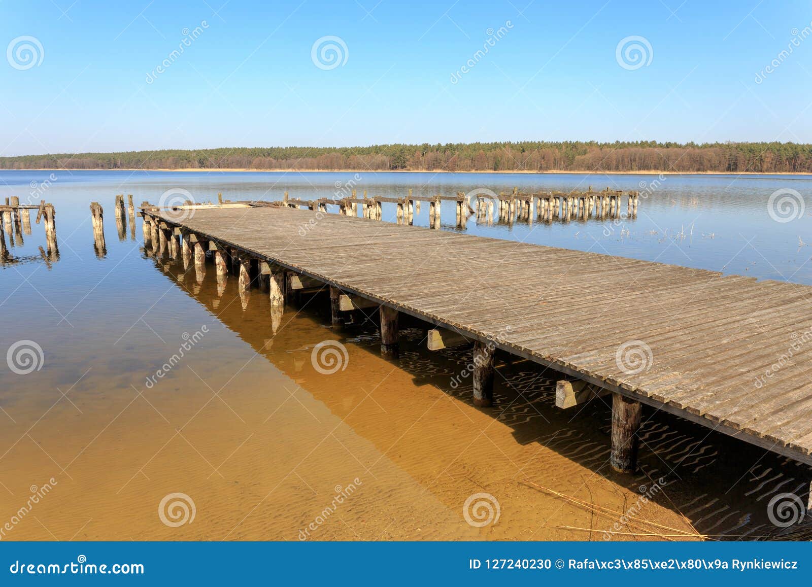 Old Destroyed Bridge Over the Lake. Stock Photo - Image of path, danger ...