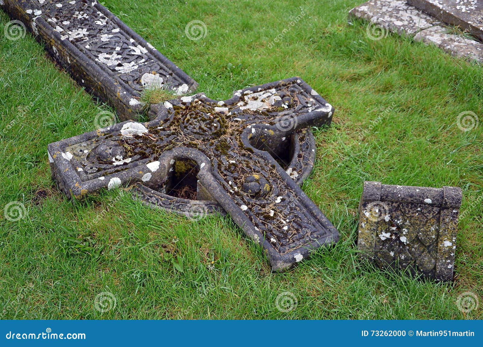 Old Destroyed Celtic Cross in the Grass on Graveyard Stock Photo ...