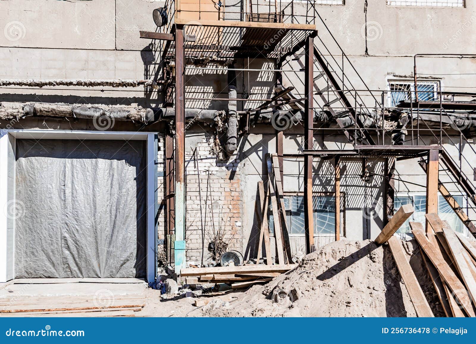 Old Destroyed Construction Site. Rusty Scaffolding and Construction ...
