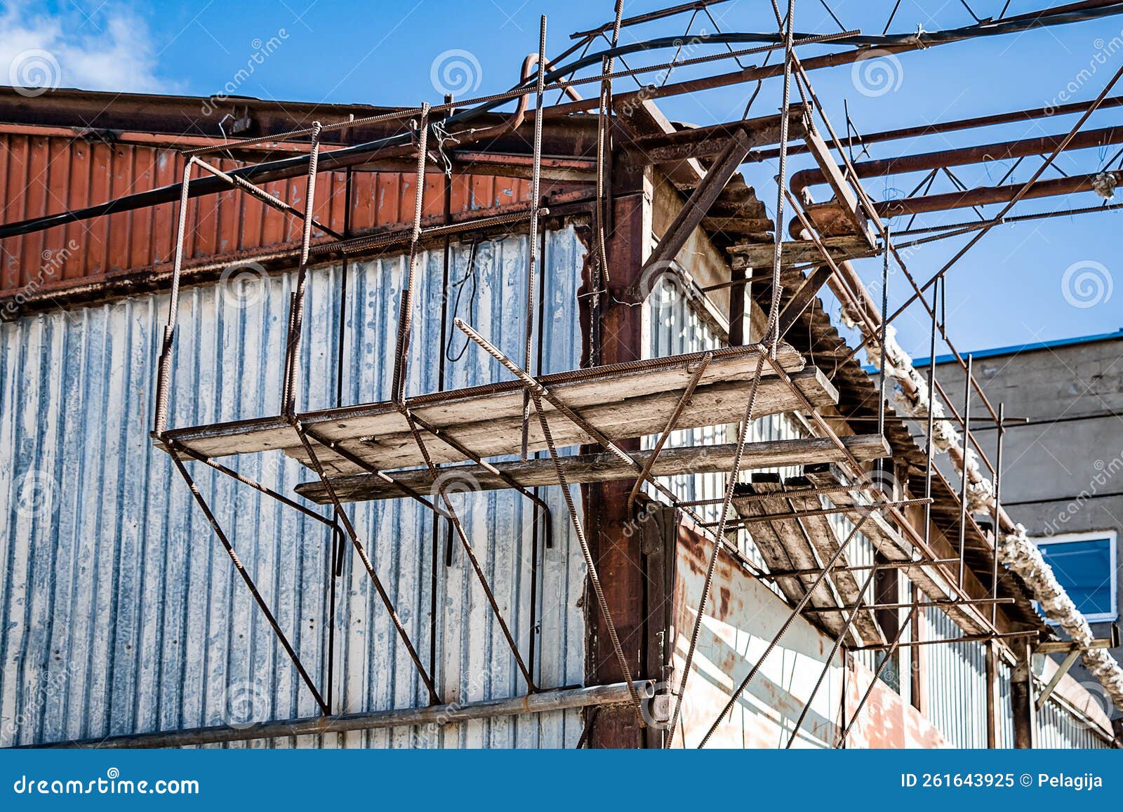 Old Destroyed Construction Site. Rusty Scaffolding and Construction ...