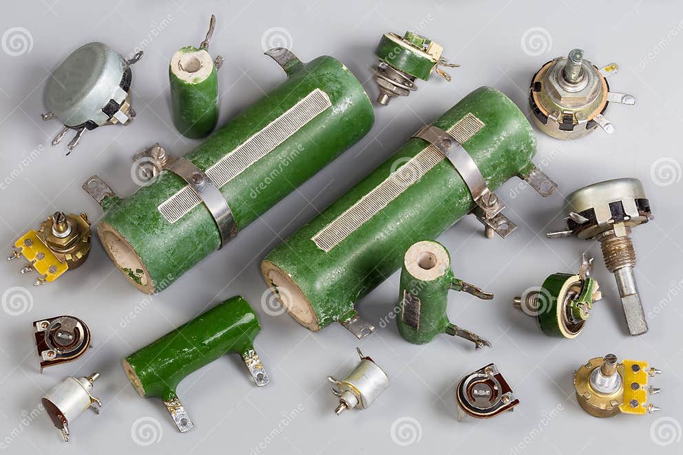 Old Different Fixed, Variable and Adjustable Resistors on a Gray ...