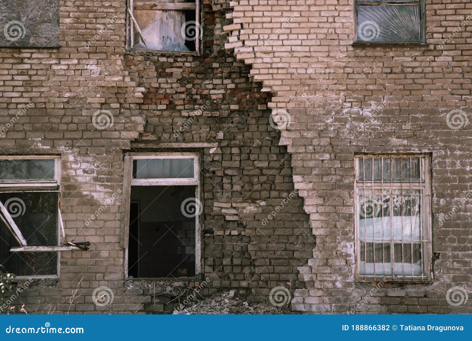 An Old Dilapidated Brick Building with a Hole in the Wall. the Concept ...