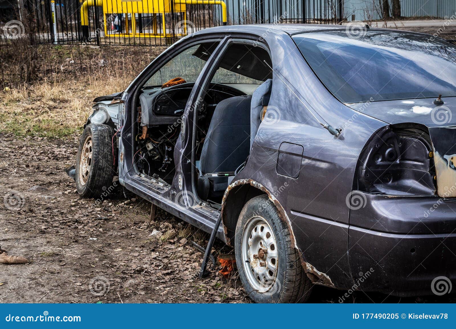 Old Dilapidated Car Abandoned on the Side of the Road. Close Up Stock ...