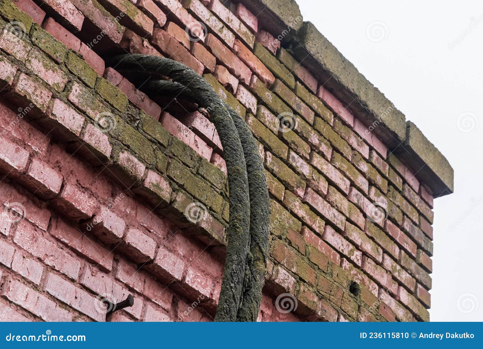 Facade Of Abandoned Rickety Brick House In Village Behind Green Wooden ...