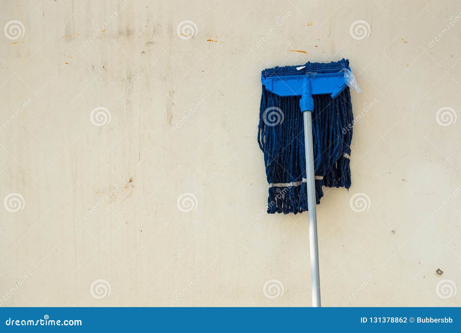 Old Dirty Mop Placed on the Wall. Stock Photo - Image of housework ...
