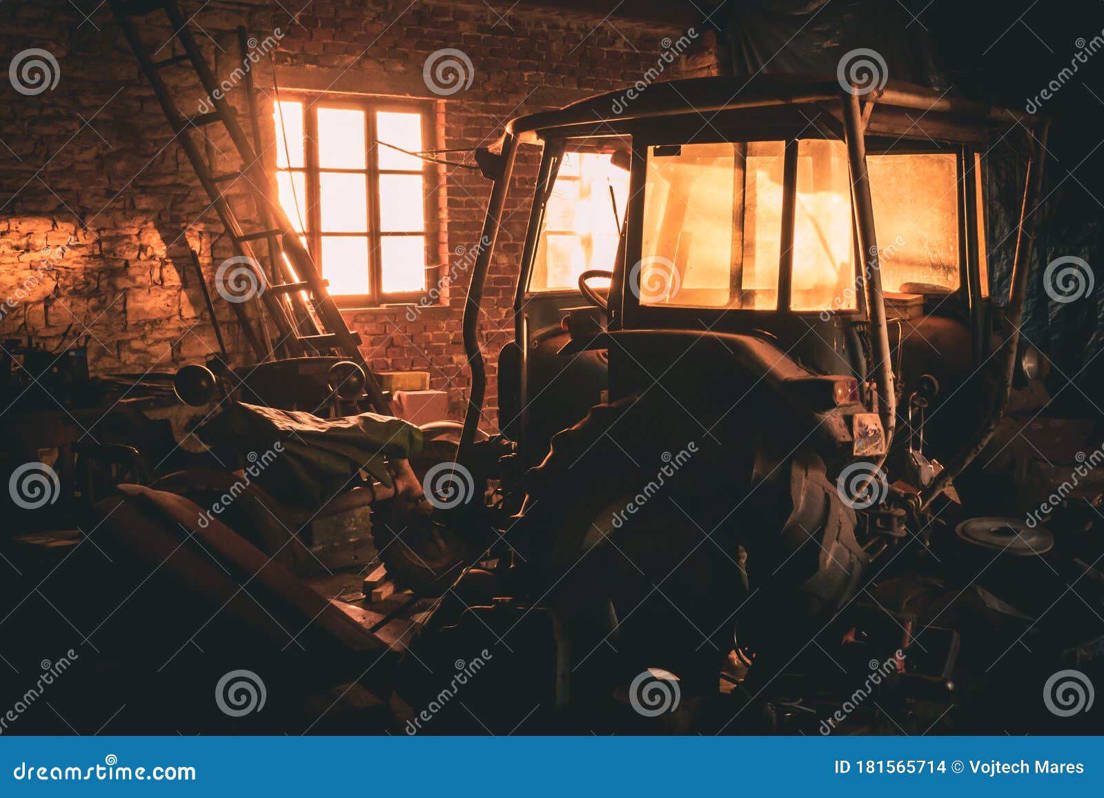 Old Tractor In The Rays Of Sunlight. Technologies Of Land Cultivation ...