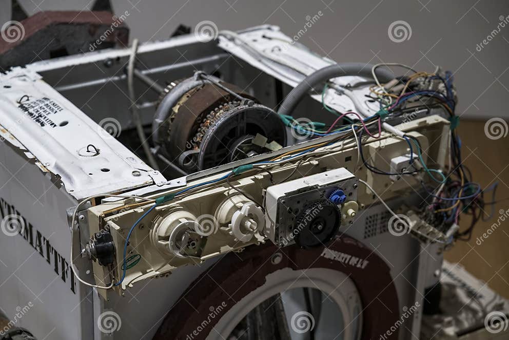 An Old Disassembled Washing Machine Stock Photo - Image of hoses, belt ...