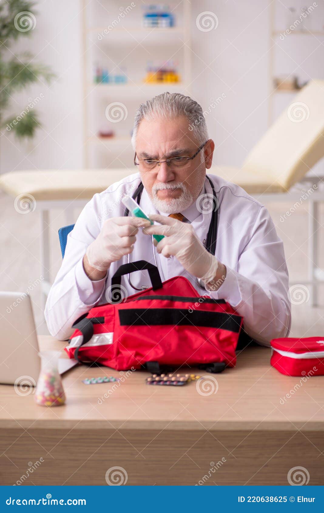 Old Male Doctor in First Aid Concept Stock Image - Image of vaccine ...